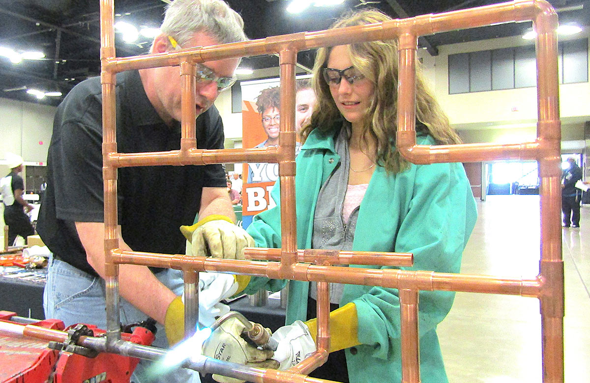 From robots to welding, QC students get a look at work world